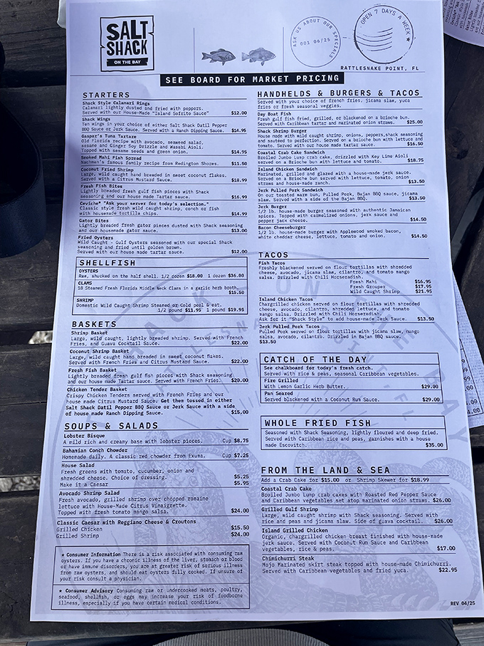 A menu that reads like a love letter to the Gulf—where deciding between grouper tacos and smoked fish dip might be the hardest decision you'll make all day.