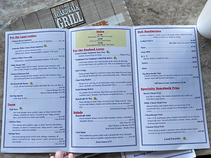 The menu reads like a love letter to seafood lovers. That "Fresh Grouper Sandwich" entry should be highlighted in neon.