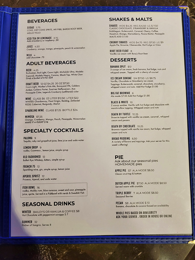 The menu reads like a love letter to comfort food classics, with adult beverages that promise to make the fish stories even better.