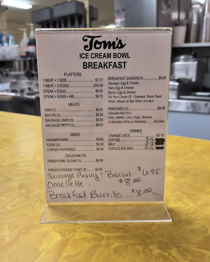 This unassuming breakfast menu might not look Instagram-worthy, but those handwritten specials hide culinary treasures that chain restaurants can only dream about.
