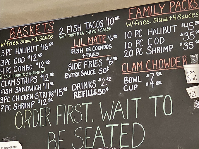 A chalkboard menu that gets straight to the point. No fancy descriptions needed when your seafood speaks for itself.