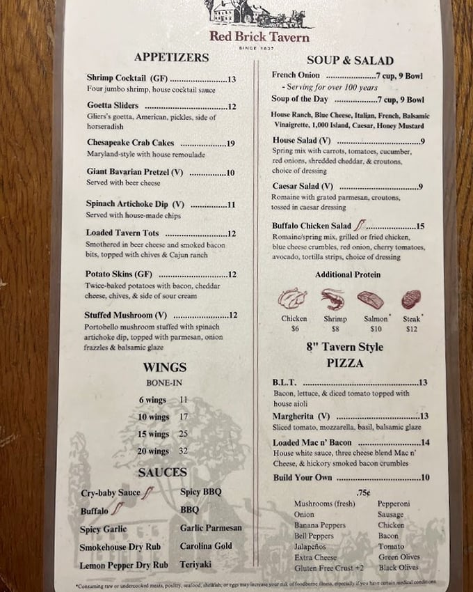 This isn't just a menu—it's a historical document. French onion soup "serving for over 100 years" isn't marketing; it's a delicious promise kept since the Teddy Roosevelt administration.