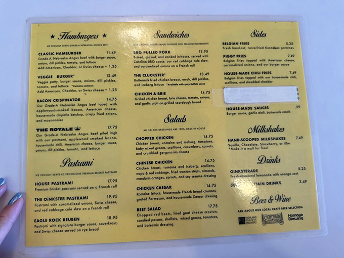 The menu reads like a love letter to American classics, each item promising a relationship more satisfying than your last three dates combined.