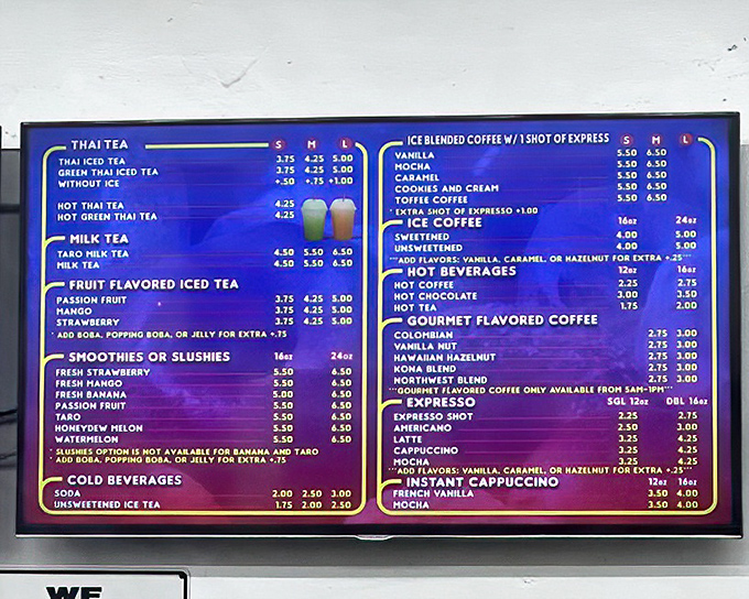 This menu board isn't just a list&mdash;it's a roadmap to happiness with Thai tea options that would make Bangkok proud.