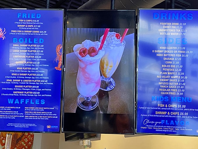 That glowing blue menu board is like a maritime treasure map, guiding hungry landlubbers to delicious discoveries. The waffle section is an unexpected plot twist!