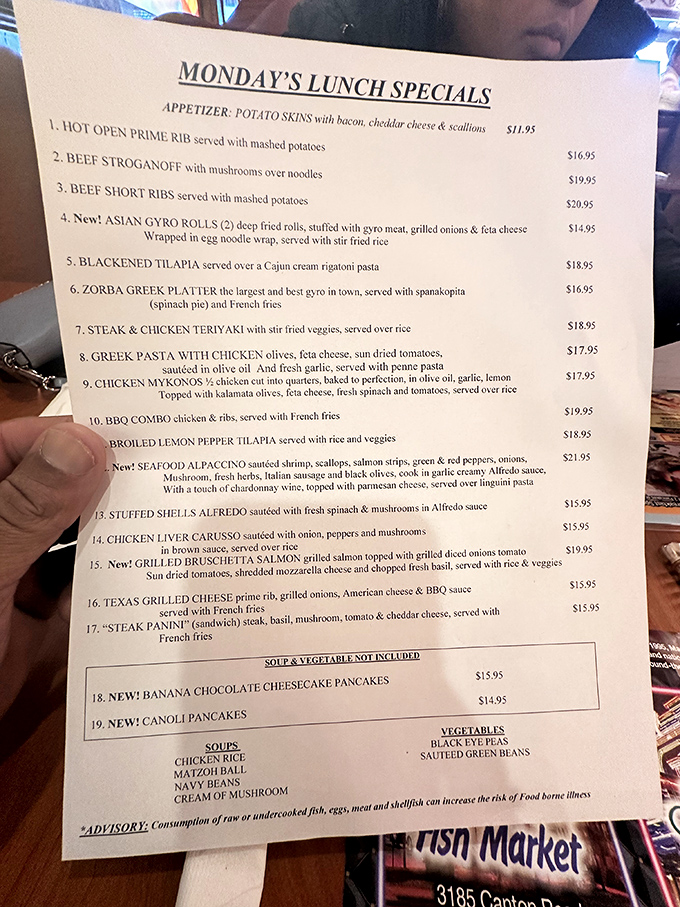 A menu so extensive it could double as light reading material. The beef stroganoff beckons from line 2, practically daring you to order anything else.