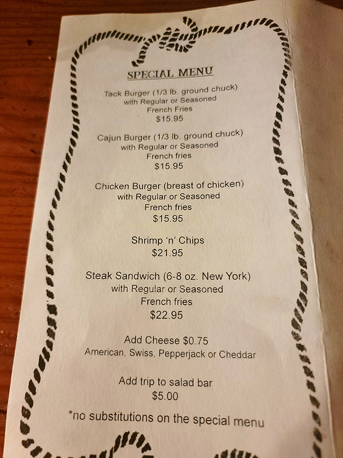 A menu bordered with rope design&mdash;simple, straightforward offerings that promise substance over flash. The steak sandwich is calling my name.