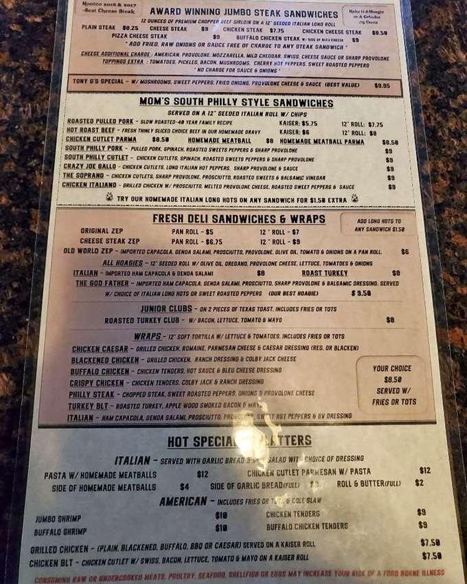 A menu that reads like poetry to hungry souls. Each line promises satisfaction, with "Award Winning Jumbo Steak Sandwiches" leading the delicious parade.