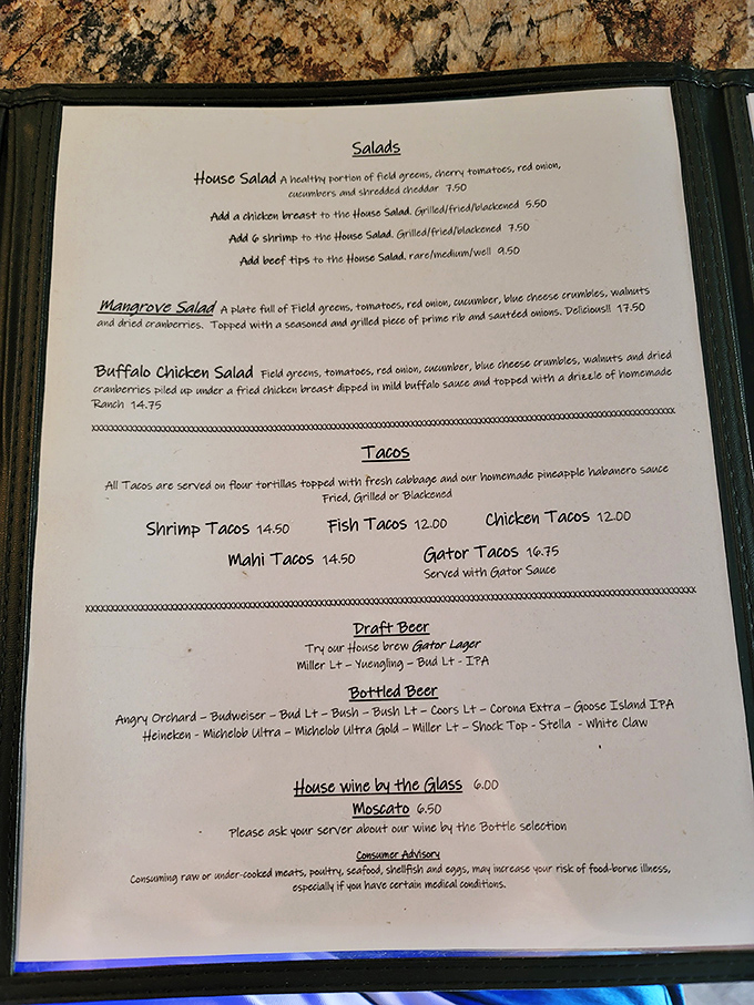 The menu tells the real story&mdash;gator tacos served with homemade pineapple habanero sauce. This isn't tourist food; it's Florida's soul on a plate.