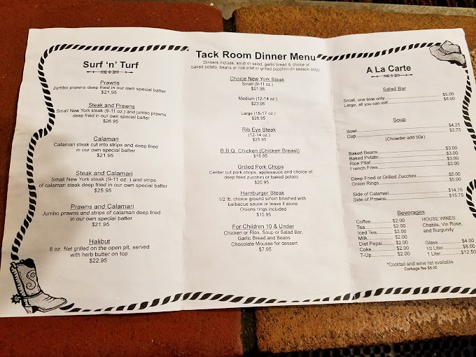 A menu bordered with rope design reveals the Tack Room's surf and turf treasures. Decision paralysis has never been so delicious.