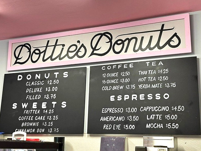 The menu board tells a simple story: great donuts, excellent coffee, and prices that won't make your wallet weep.