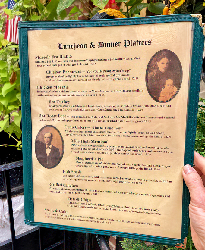 A menu that reads like Philadelphia's culinary autobiography, where historic portraits watch over comfort classics that have stood the test of time.