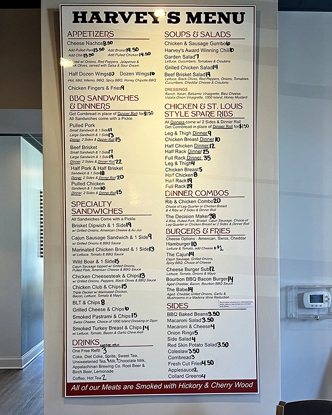 A menu that reads like a love letter to smoked meats. Notice how they proudly declare their hickory and cherry wood smoking method&mdash;the BBQ equivalent of name-dropping.