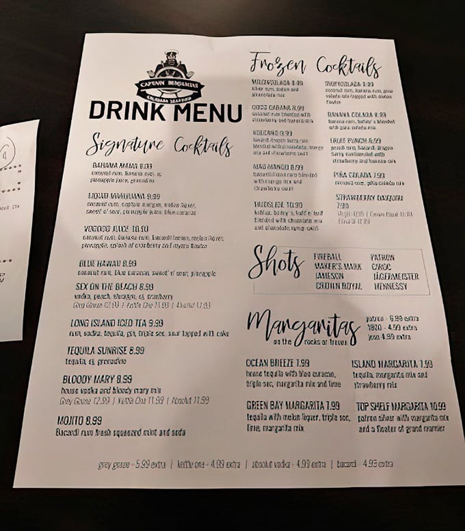 The drink menu reads like a passport to vacation mode. One sip of that Blue Hawaii and you'll swear you can hear ukuleles playing.