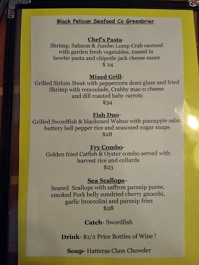 A menu that reads like a love letter to seafood, with that Mixed Grill calling your name. Half-price wine bottles? Now we're talking!