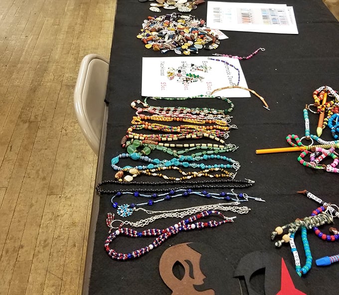 Sparkling jewelry spreads like a pirate's treasure hoard, each piece whispering tales of glamorous nights past.