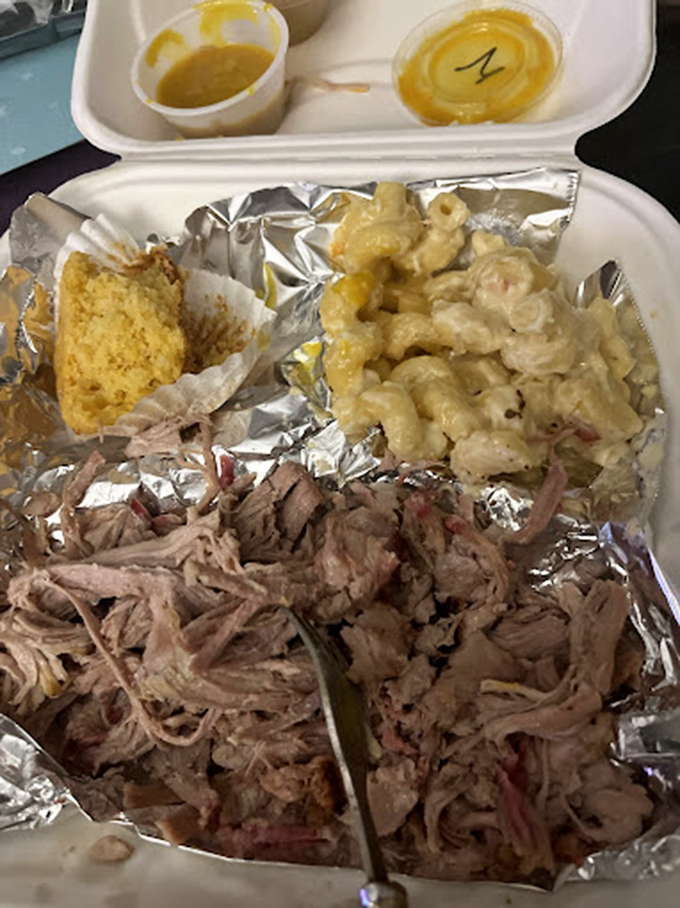 Pulled pork so tender it practically surrenders to your fork. This isn't just meat&mdash;it's a smoky love letter to patience.