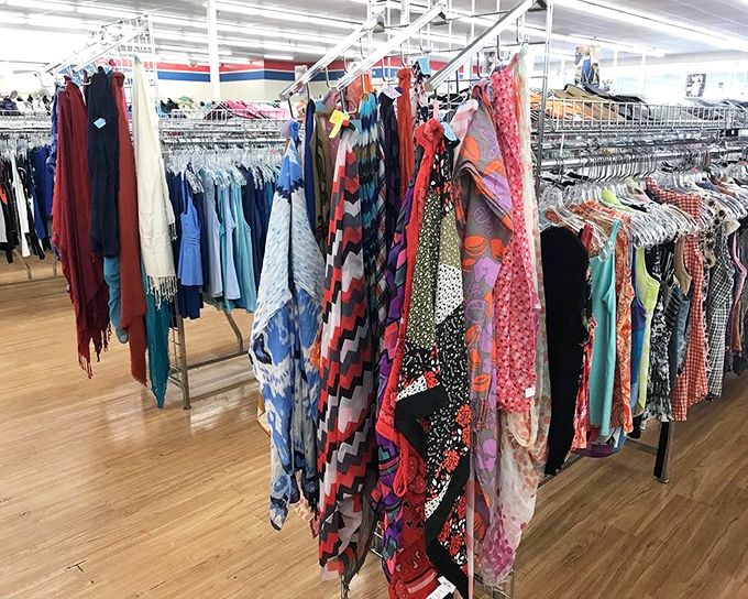 A rainbow of fabrics tells a thousand stories. Each scarf and blouse once belonged somewhere else&mdash;now they're waiting for your next chapter.