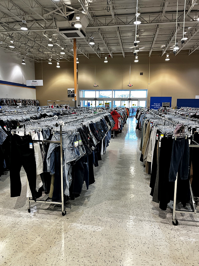 Endless racks stretch like a fashion highway, each hanger holding someone's future "I can't believe I found this!"