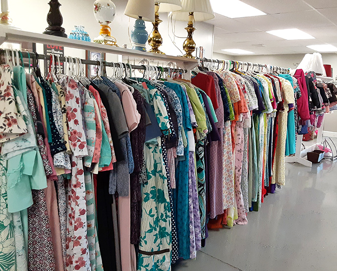 A rainbow of possibilities hangs in perfect order. Each garment has a story, and someone's next favorite outfit is waiting.