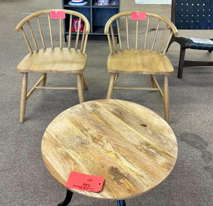 Mid-century charm meets modern budget &ndash; these wooden chairs and table are just waiting to host your next dinner party or morning coffee ritual.