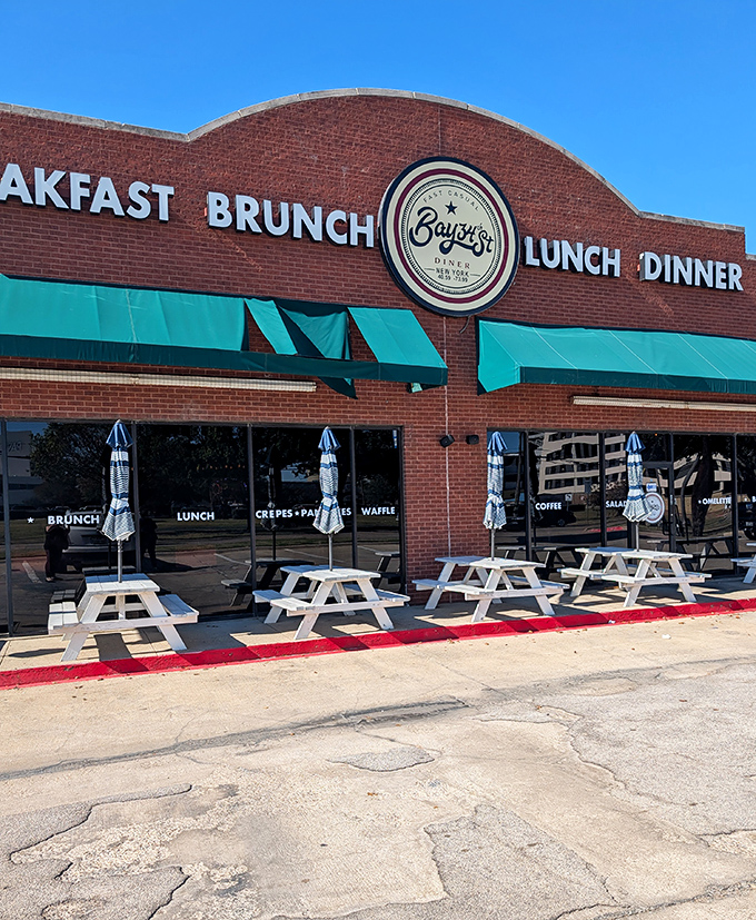 The outdoor seating at Bay34th might be simple, but the breakfast magic happening inside is anything but basic.