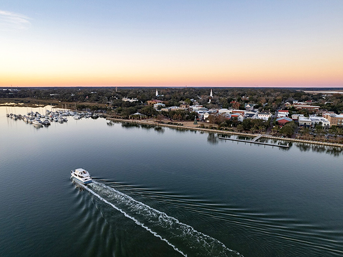 Golden skies, calm waters, and a boat gliding by&mdash;Beaufort&rsquo;s peaceful waterfront is the perfect spot to unwind and explore. 