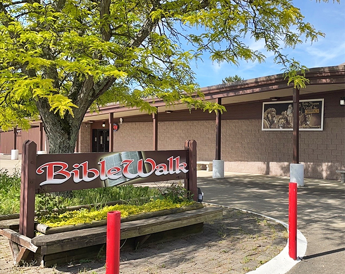 No ordinary Sunday school here! The BibleWalk sign welcomes visitors to a world where biblical stories stand still.