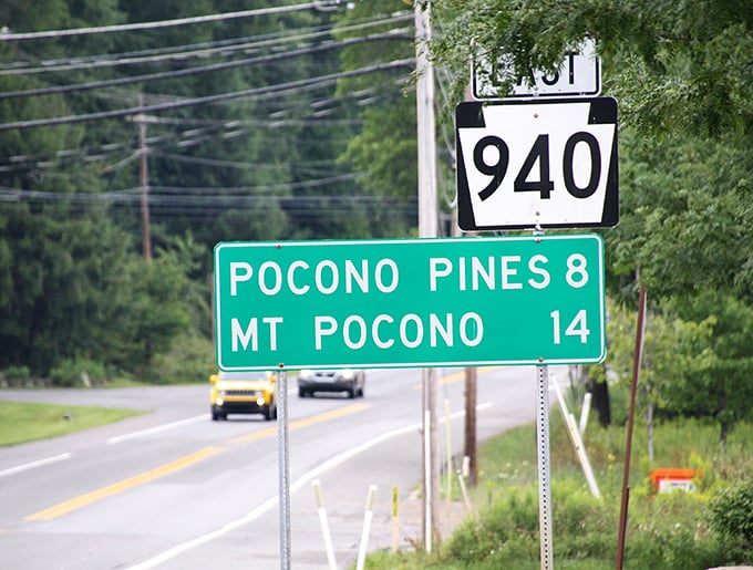 That road sign to Pocono Pines might as well say "This way to forget your troubles, friend."