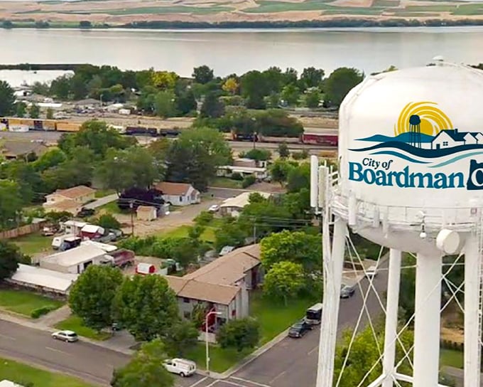 Boardman's water tower stands tall, announcing to travelers: "Yes, we're small, but we've got everything you actually need!"