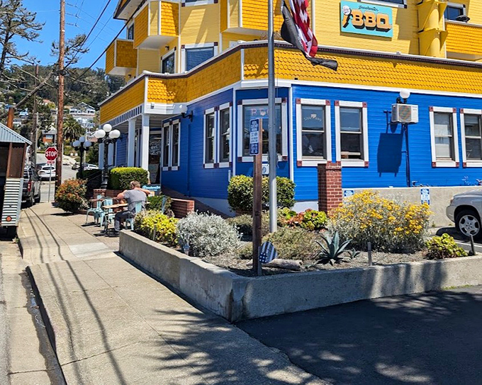 Breakwater's sunny yellow and blue exterior is as cheerful as finding great BBQ by the sea is unexpected.