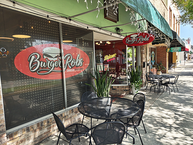 BurgerRobs' green awning and brick exterior offer a hint of the smash burger paradise waiting inside.