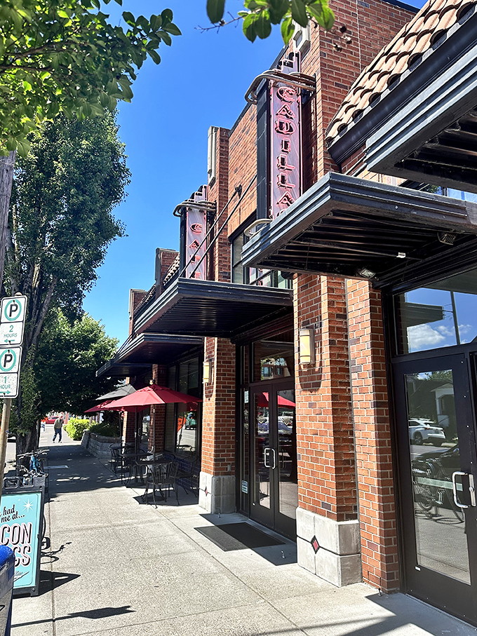 Cadillac Cafe's brick facade and outdoor seating whisper "stay awhile" &ndash; a breakfast sanctuary amid the urban bustle.