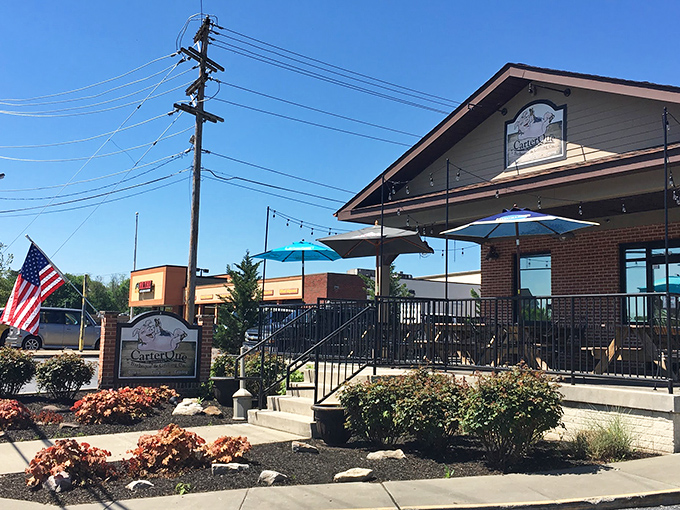 CarterQue's inviting porch practically whispers "come sit a spell" while the aroma of smoked meats shouts "stay for dinner!"