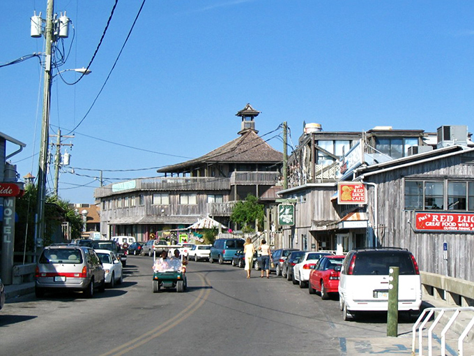 Cedar Key's weathered wooden buildings whisper tales of Old Florida, when flip-flops were considered formal wear everywhere.