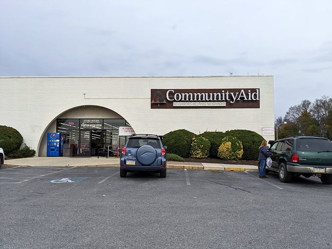 Community Aid's distinctive arched entrance invites shoppers into a world where every purchase helps a neighbor in need.