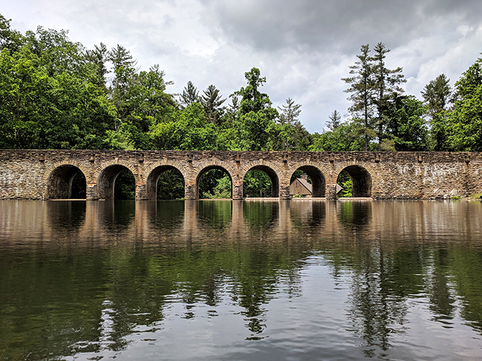 Cumberland County's stone bridge spans peaceful waters like something from a fairy tale. Nature and craftsmanship in perfect harmony.