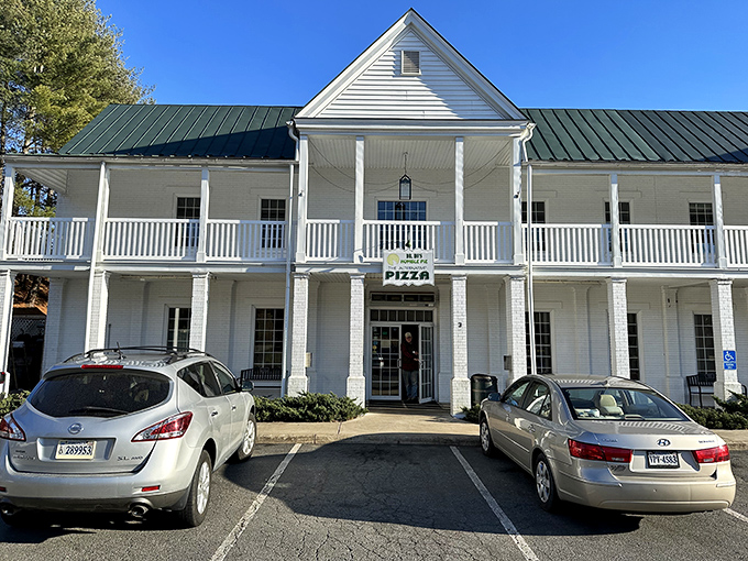 Dr. Ho's charming white farmhouse exterior feels like arriving at a pizza sanctuary. Pilgrims welcome!