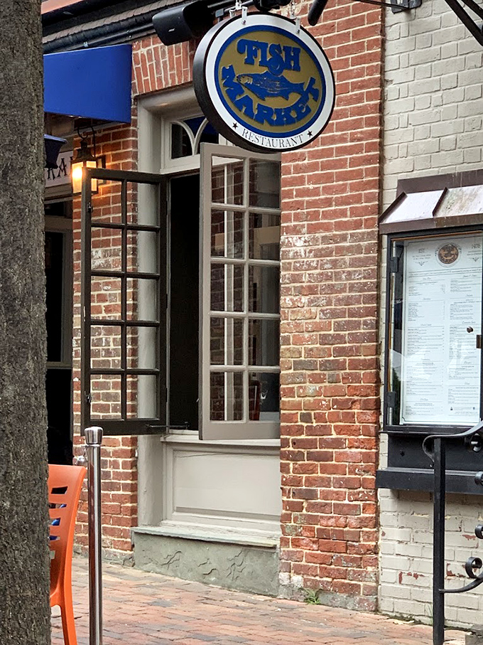 Fish Market Restaurant's classic brick facade and vintage sign promise seafood traditions that have stood the test of time.
