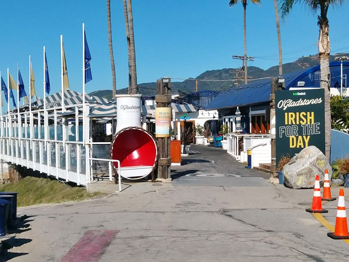 Gladstones Restaurant: White railings and blue accents create the perfect coastal vibe. This Pacific Palisades institution looks ready for its close-up!