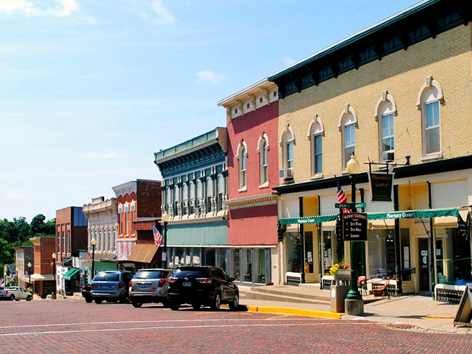 Mount Carroll's historic buildings stand proudly against a blue sky, like actors refusing to leave the stage after 150 years.