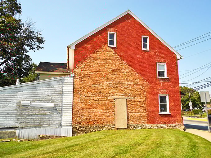 New Holland's countryside showcases the elegant simplicity of Amish transportation against golden farmland vistas.