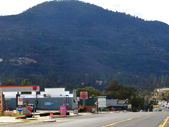 Oakhurst's mountain backdrop frames the everyday. That gas station isn't just selling fuel; it's selling a postcard view at no extra charge.