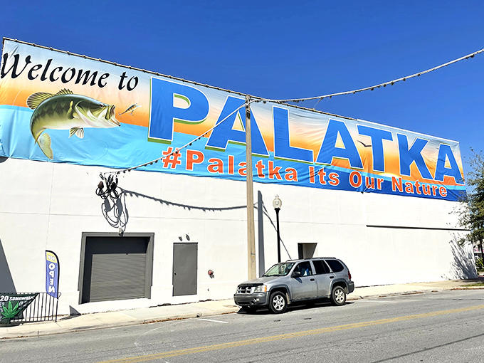 Fish tales and warm welcomes! Palatka's banner announces you've arrived somewhere authentic—where fishing stories grow bigger by the hour.