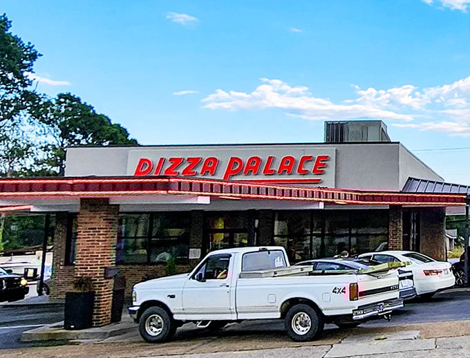 Pizza Palace's retro charm takes you back to simpler times when drive-ins ruled and pizza was an event.
