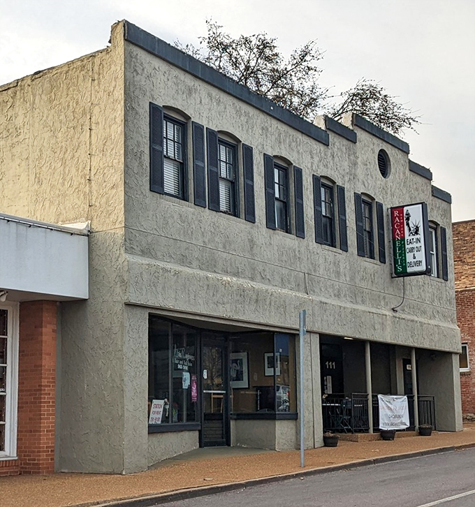 Racanelli's stately exterior might fool you, but inside those walls, New York-style pizza magic happens one toss at a time.