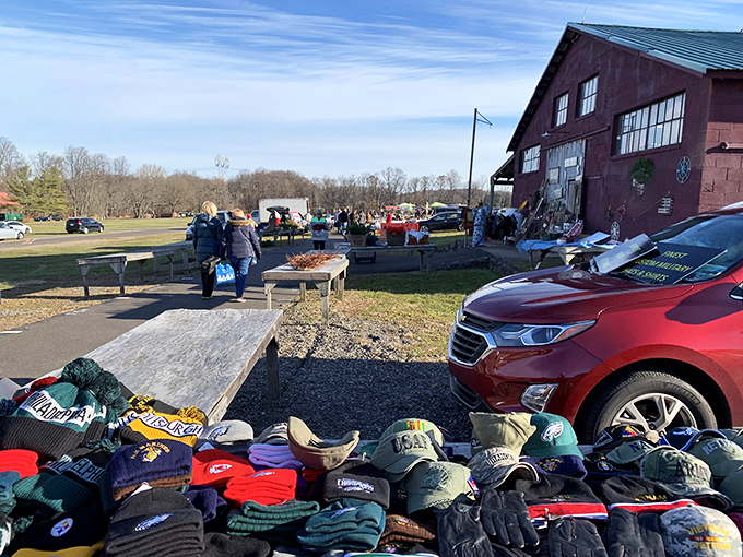 Sports fan paradise! That sea of team caps would make any collector's heart skip&mdash;Eagles, Steelers, and Pirates all waiting for their forever home.