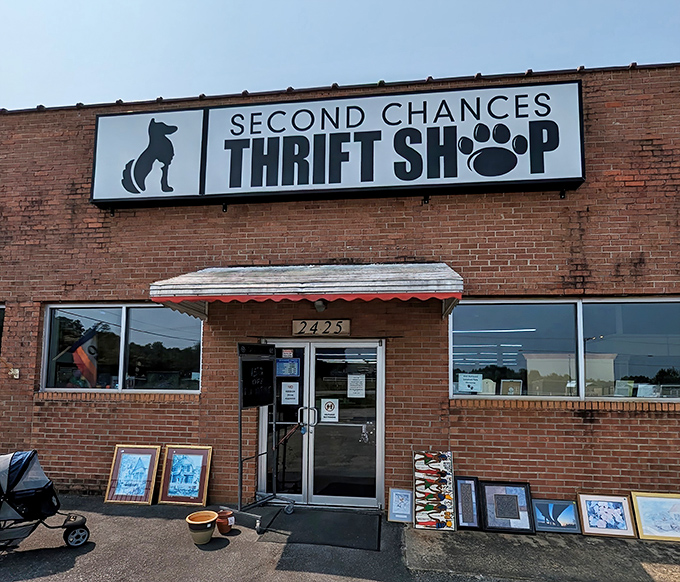 Second Chances Thrift Shop's brick facade hides a treasure trove where every purchase helps furry friends find their forever homes. 