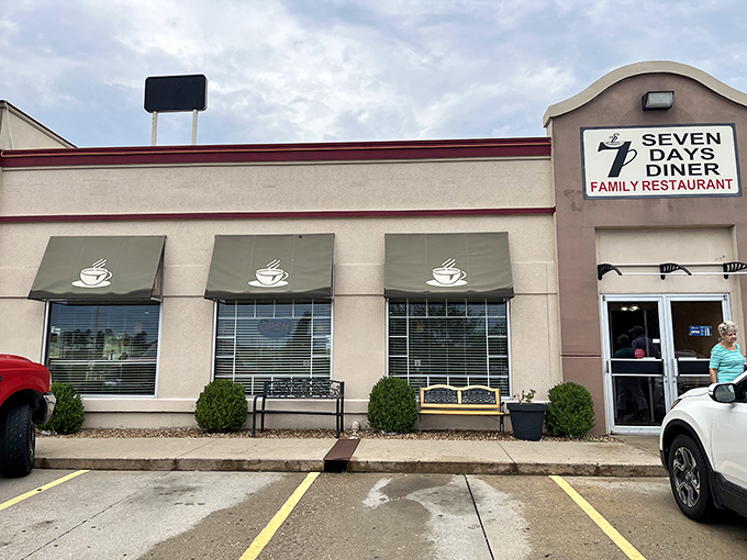 Seven Days Diner's modest exterior belies the breakfast magic happening inside – where coffee cups are always full and pancakes reign supreme.