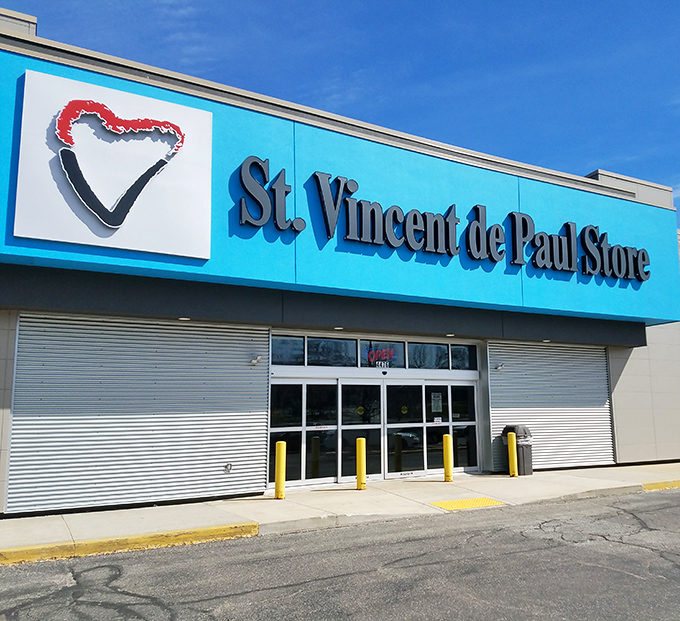St. Vincent de Paul's bright blue façade stands out like a beacon for thrift shoppers seeking their next great discovery.